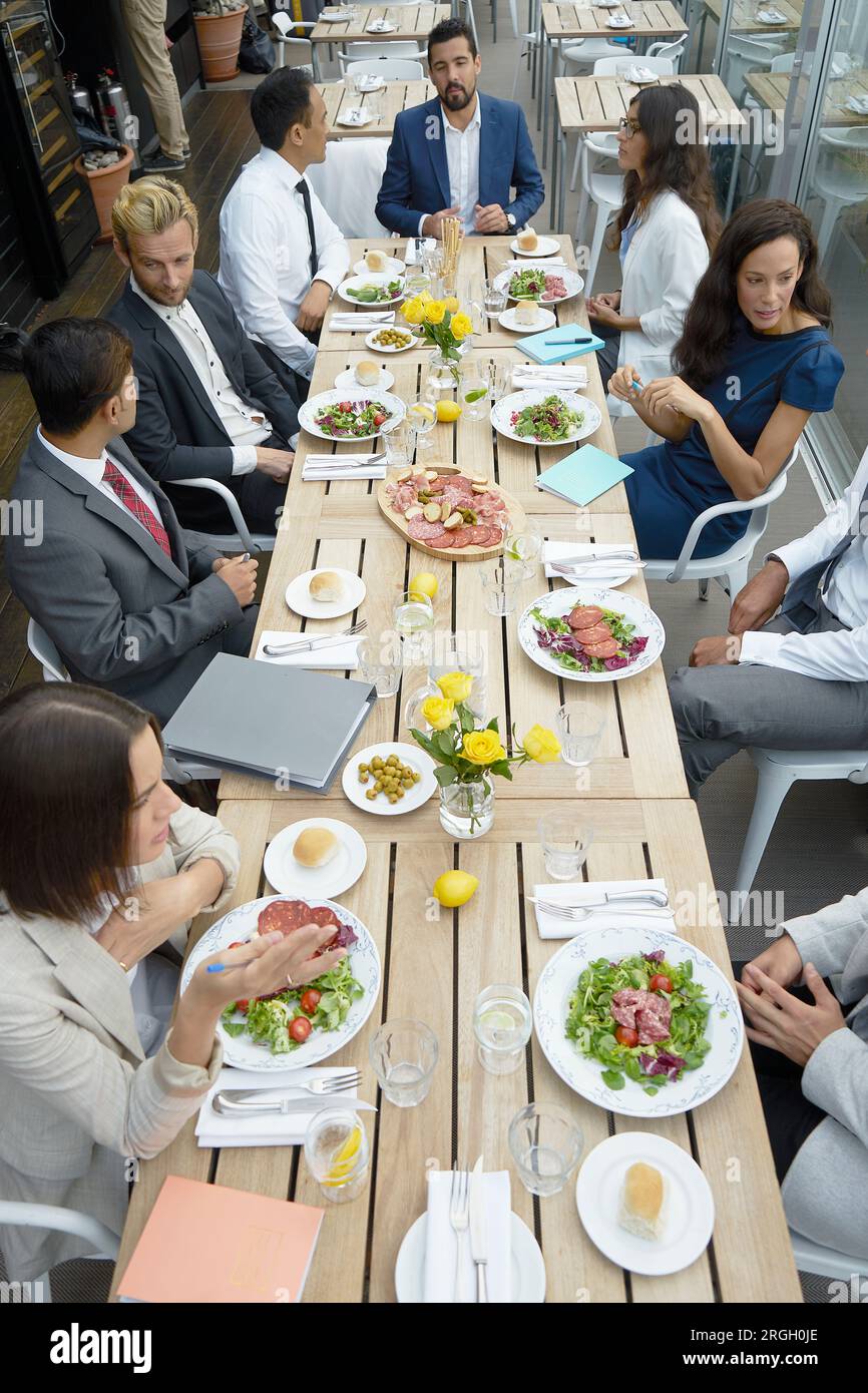 Young worker table setting hi-res stock photography and images - Alamy