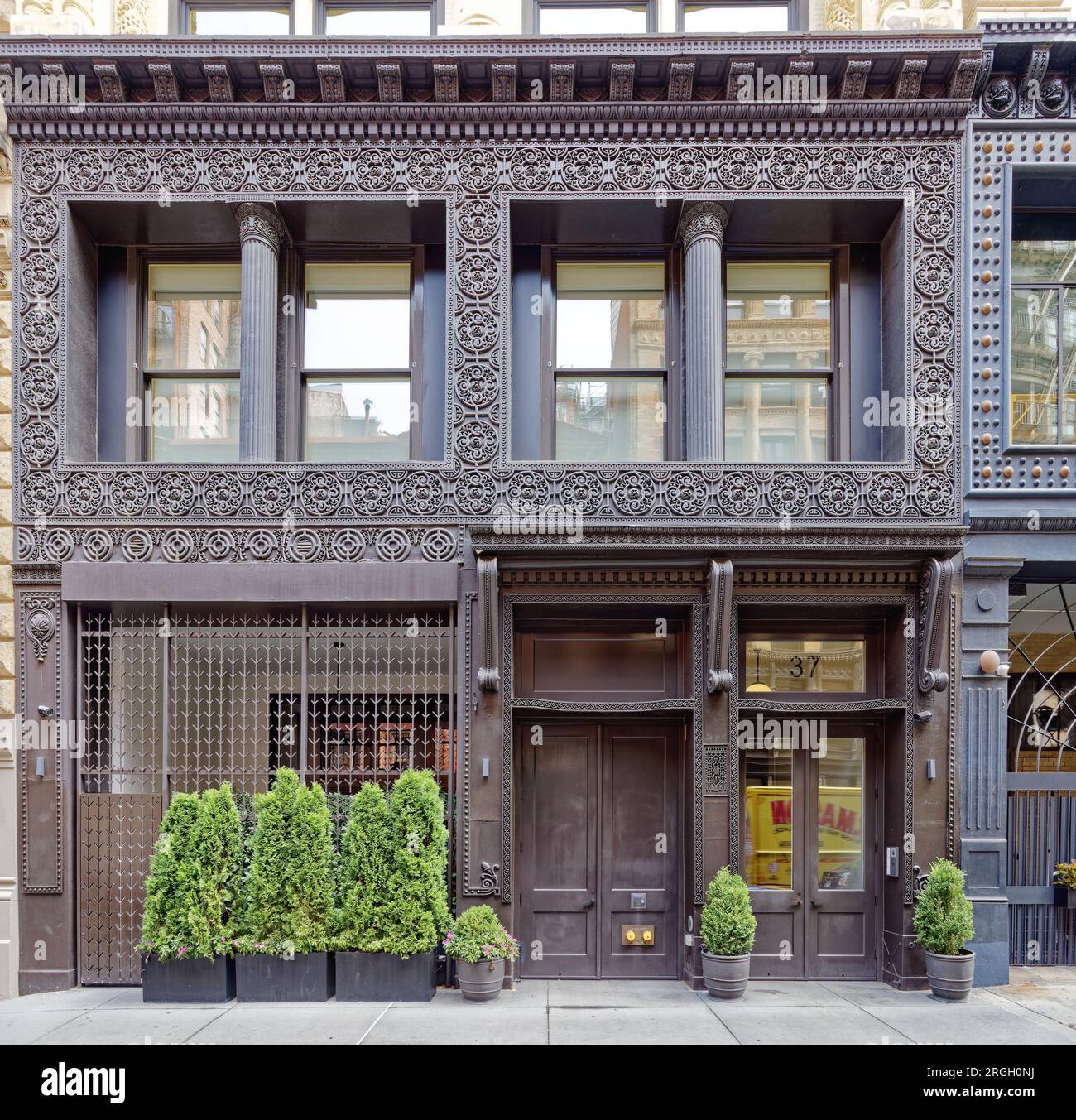 Greenwich Village: 37 East 12th Street blends an ornate cast iron base ...