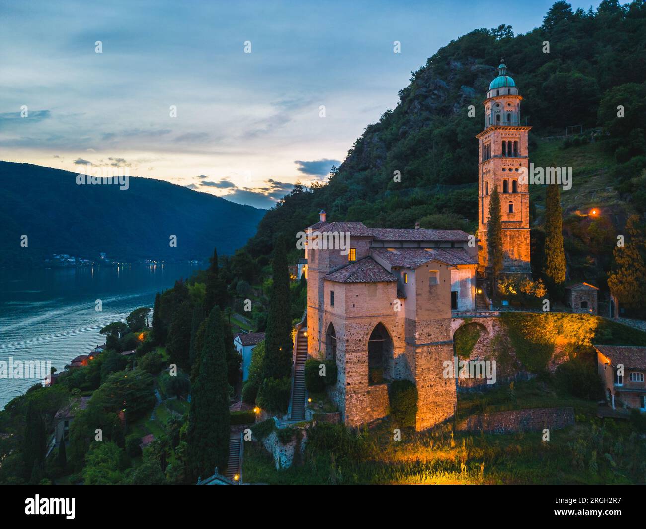 Aerial view of the Swiss village of Morcote during dusk. Morcote ...