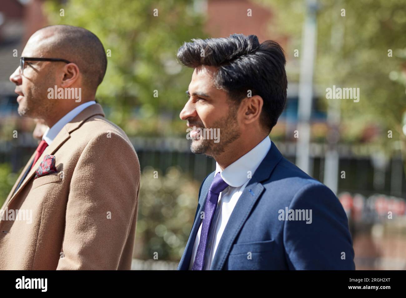 Side view of two businessmen Stock Photo - Alamy