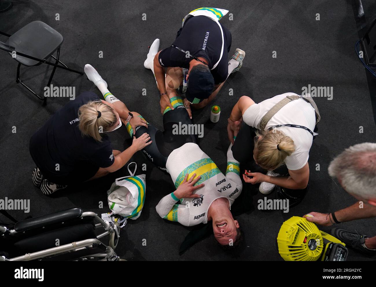 Australia’s Matthew Richardson receives treatment after riding in the ...
