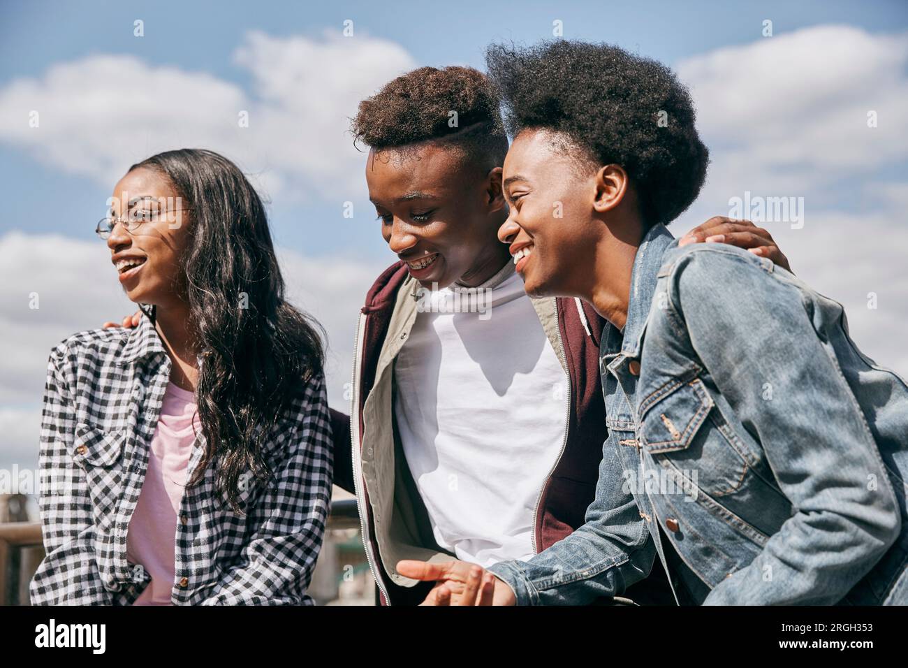 Teenage friends talking together Stock Photo - Alamy