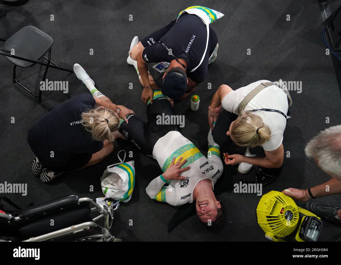 Australia’s Matthew Richardson receives treatment after riding in the ...