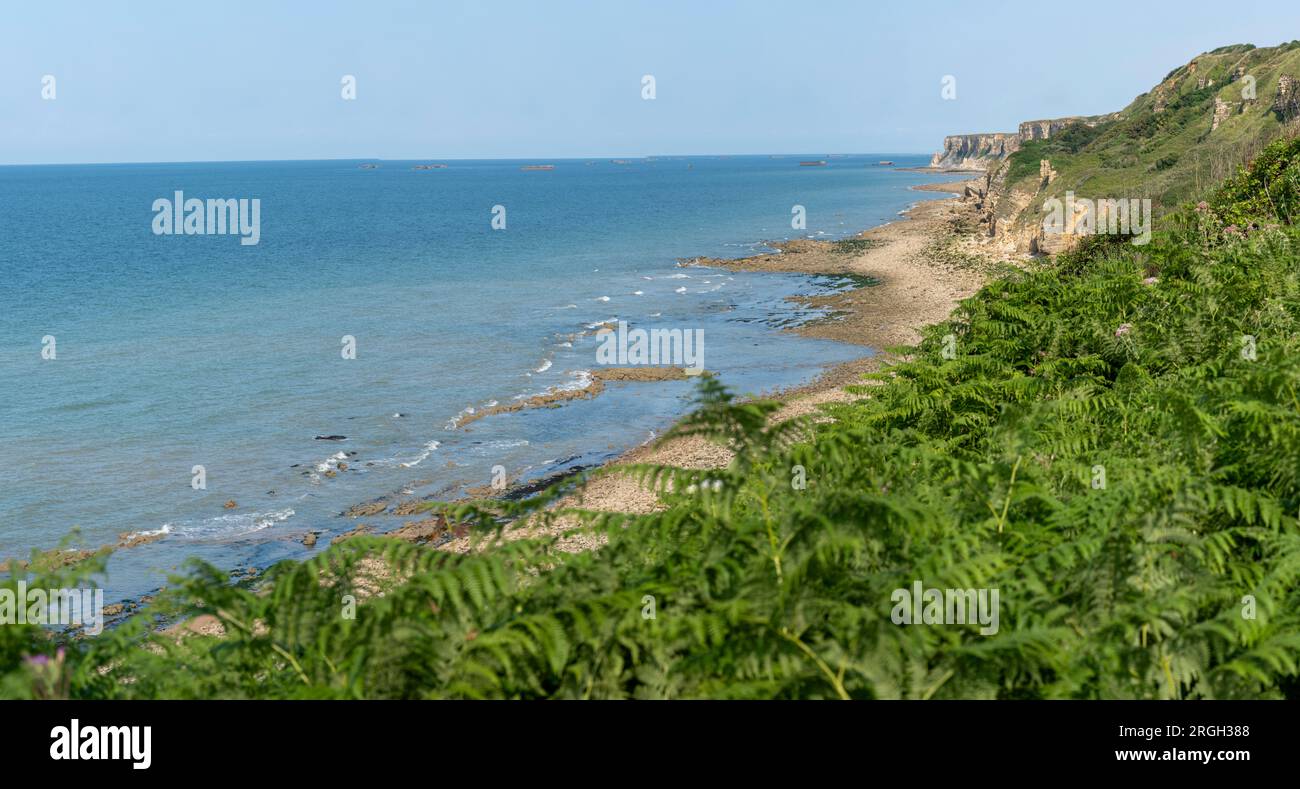 Battery of Longues-sur-Mer. View of the pebble beach surrounded by ...