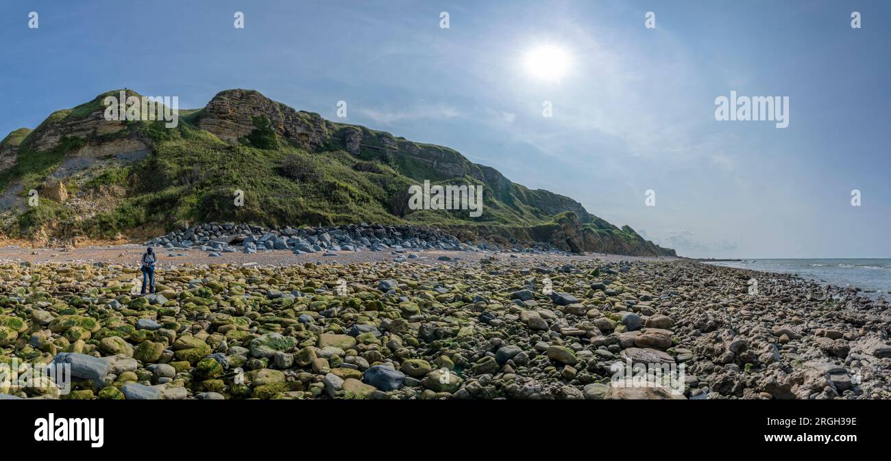 Battery of Longues-sur-Mer. View of the pebble beach surrounded by ...