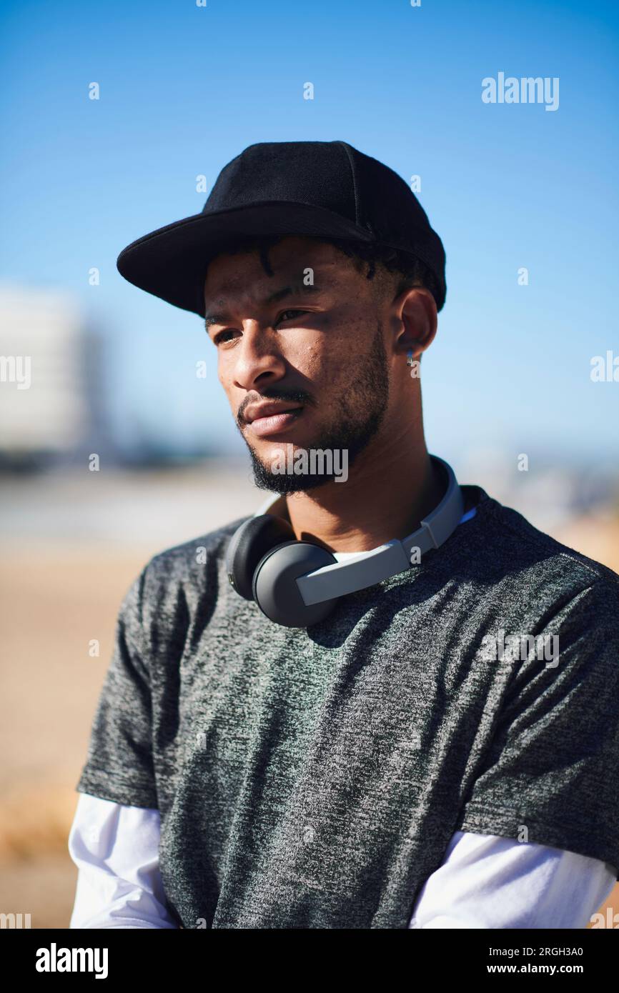 Man and baseball cap hi-res stock photography and images - Alamy
