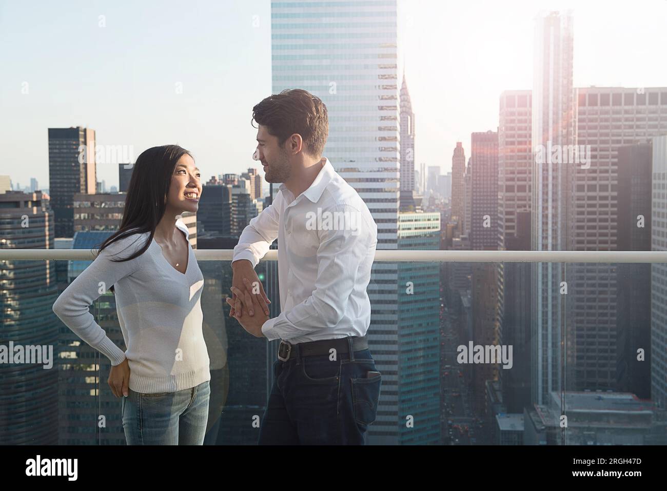 Women rooftop city hi-res stock photography and images - Alamy