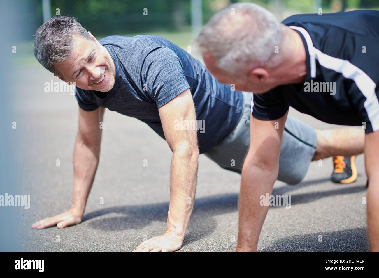 Mature men doing push-ups Stock Photo - Alamy