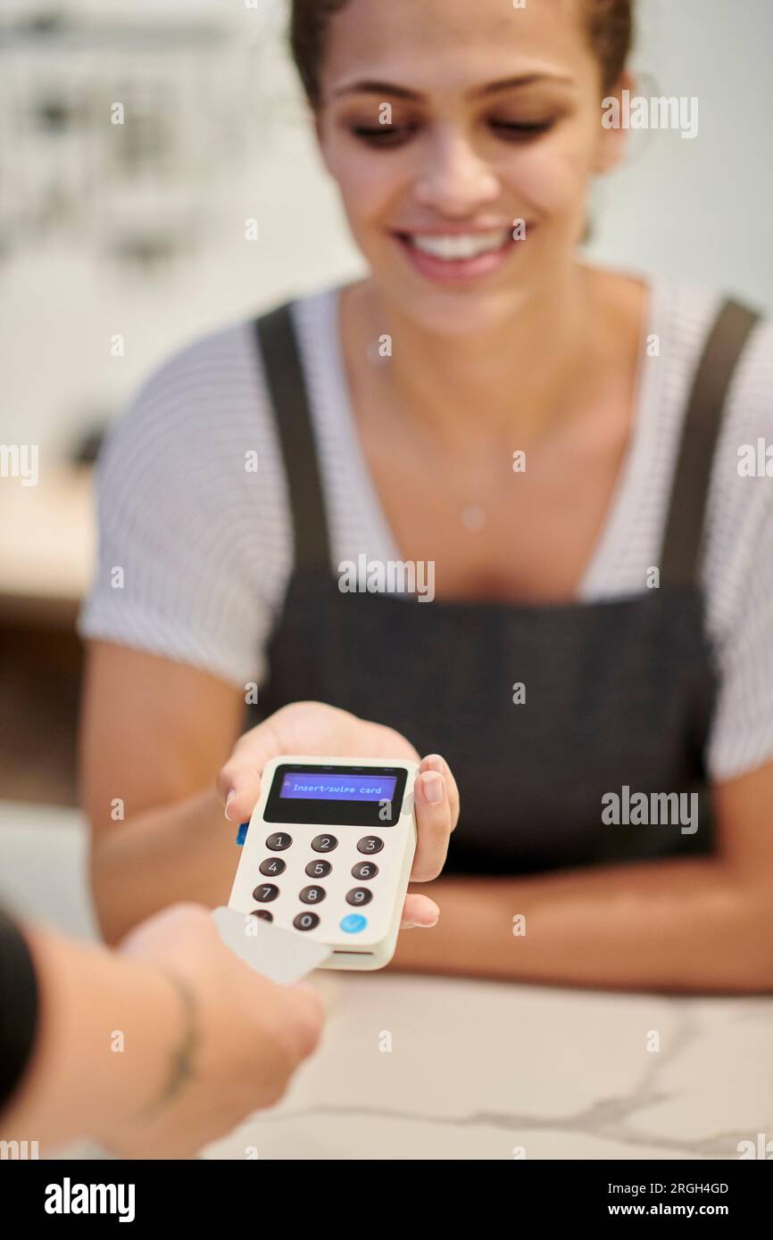 Customer using credit card hi-res stock photography and images - Alamy