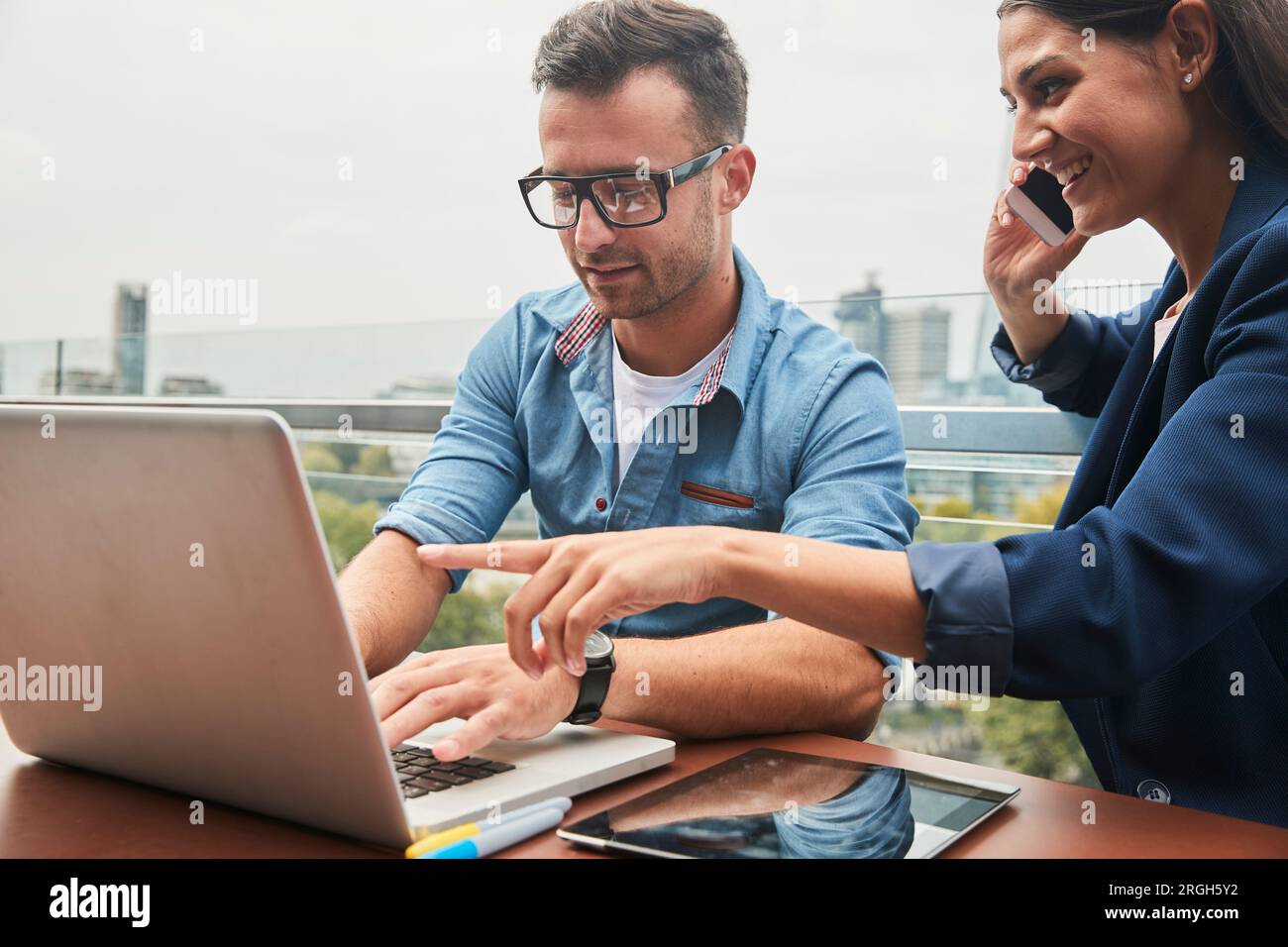 People using phones on meeting hi-res stock photography and images - Alamy