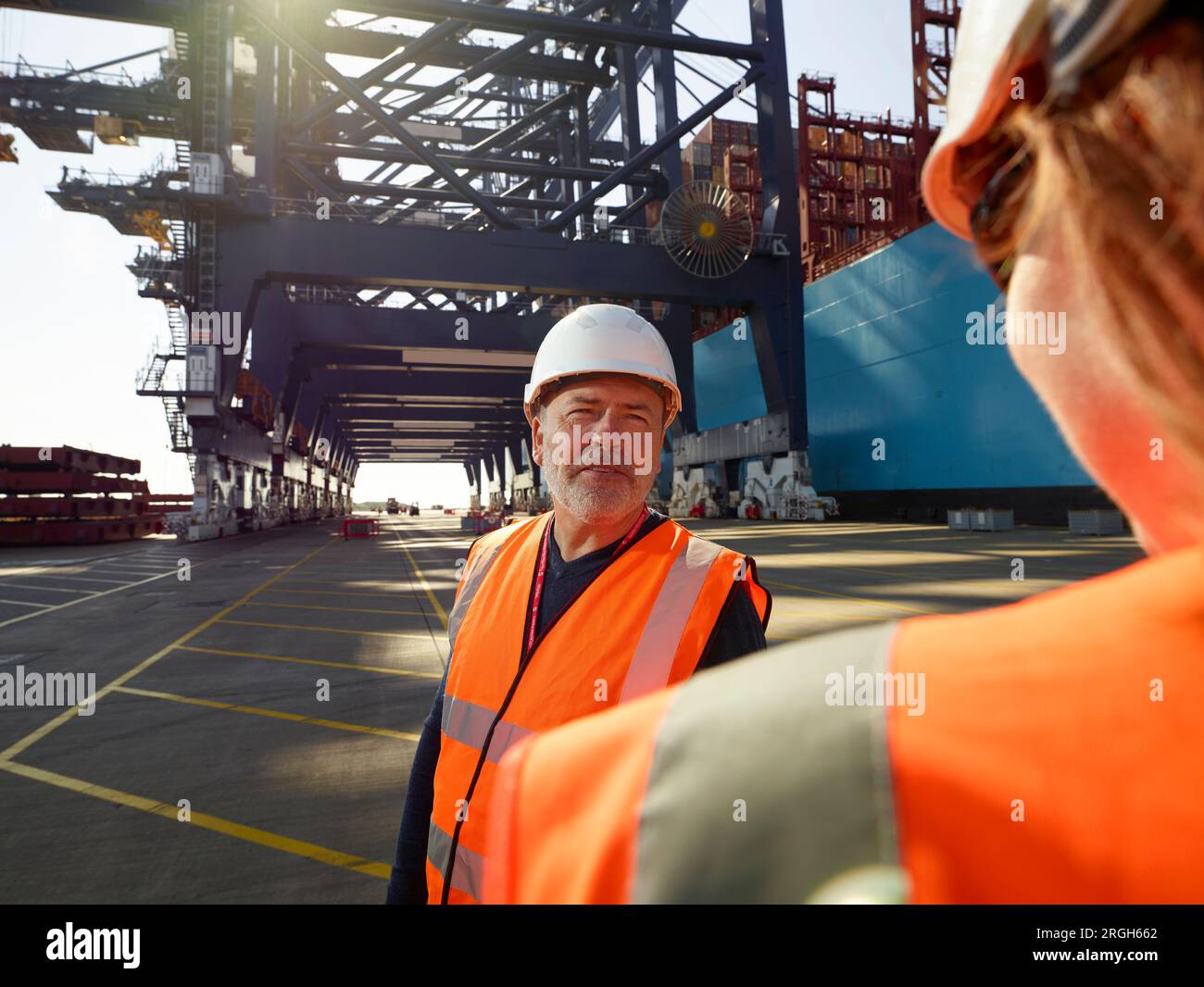 Dock workers by cargo ship at Port of Felixstowe, England Stock Photo ...