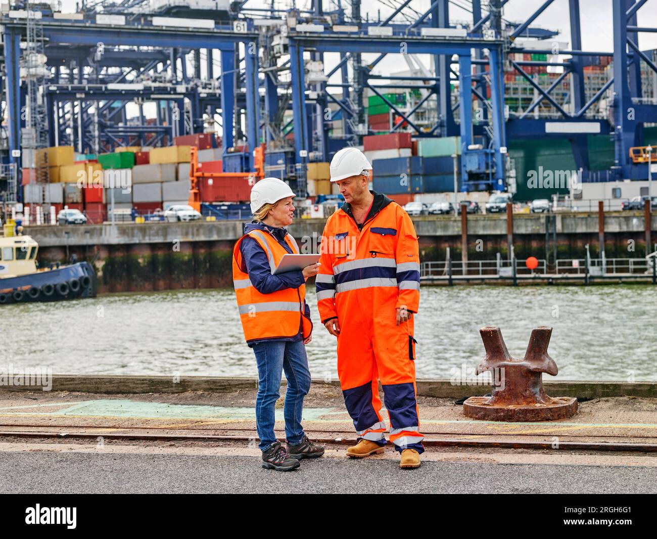 Dock workers with digital tablet at Port of Felixstowe, England Stock ...