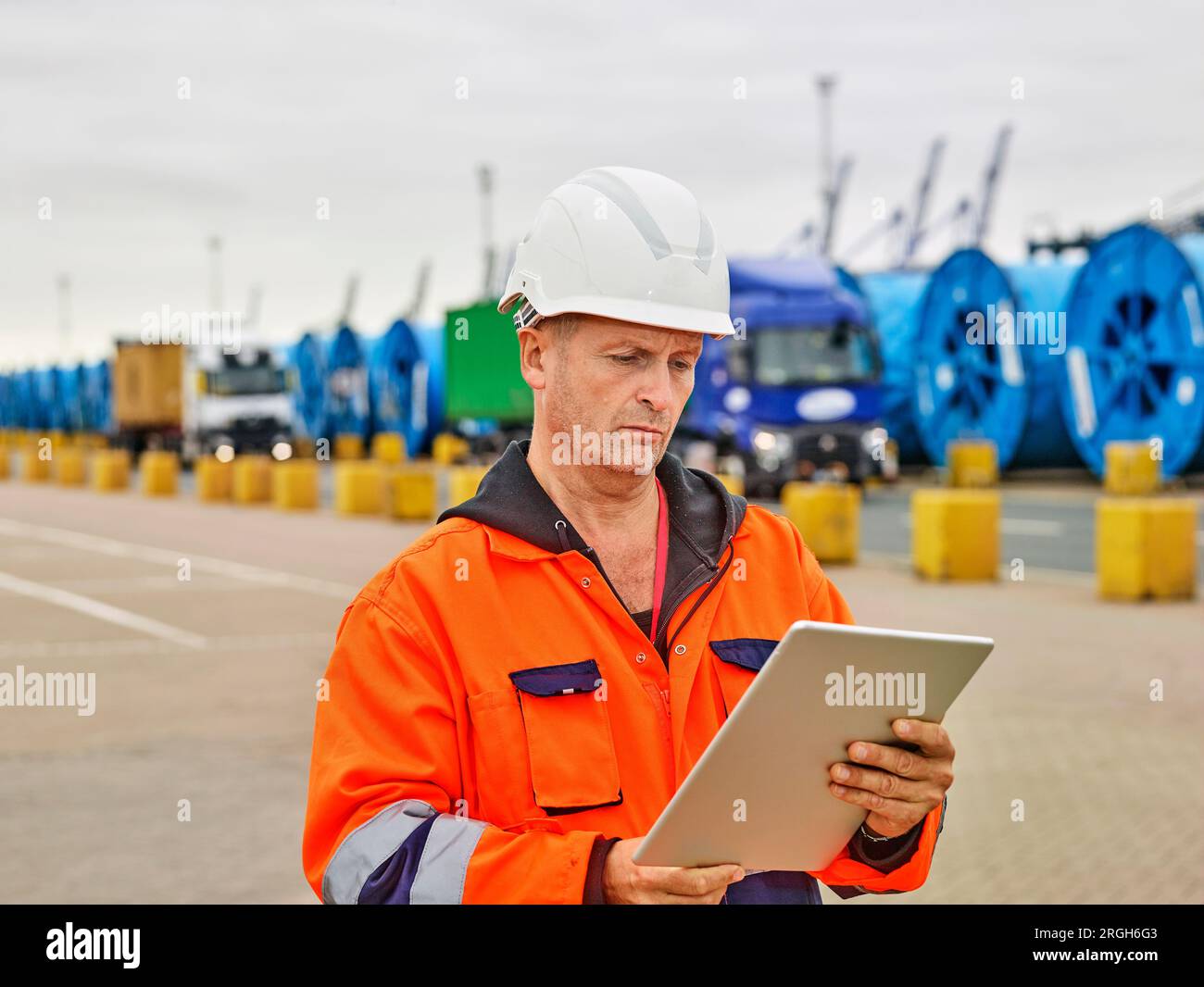 Dock worker with digital tablet at Port of Felixstowe, England Stock ...