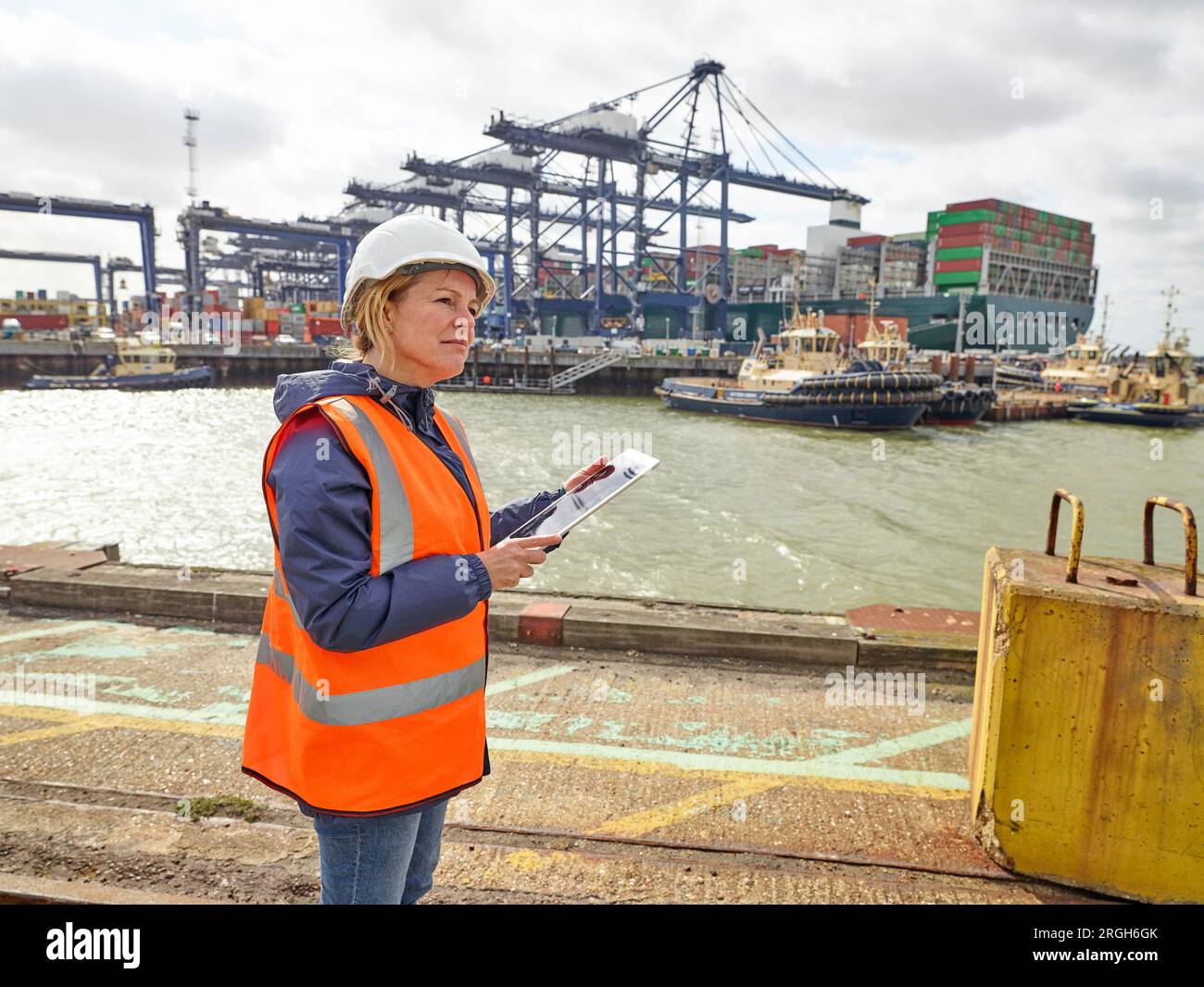 Dock worker with digital tablet at Port of Felixstowe, England Stock ...