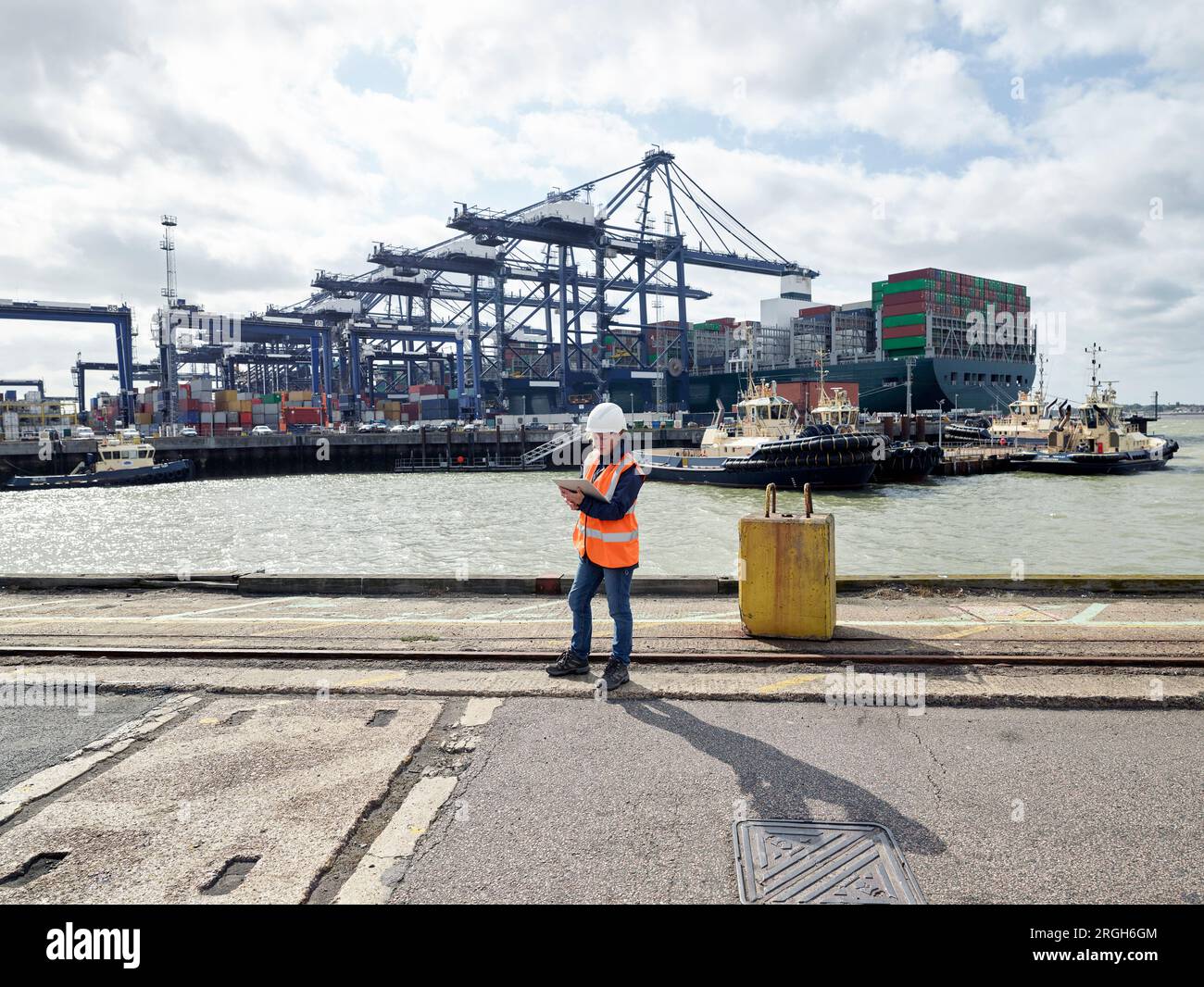 Dock worker with digital tablet at Port of Felixstowe, England Stock ...