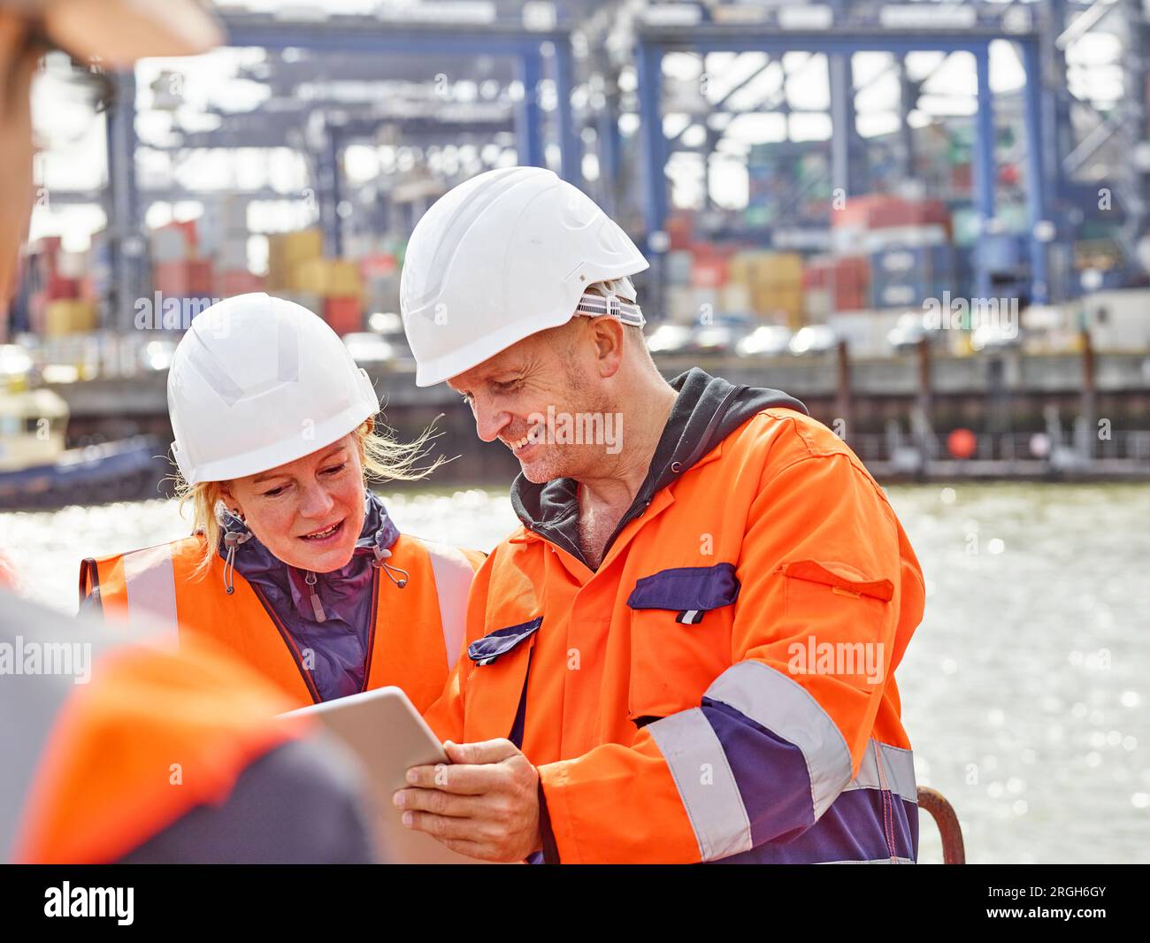 Dock workers with digital tablet at Port of Felixstowe, England Stock ...