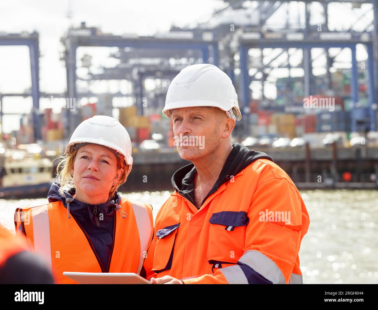 Dock workers with digital tablet at Port of Felixstowe, England Stock ...
