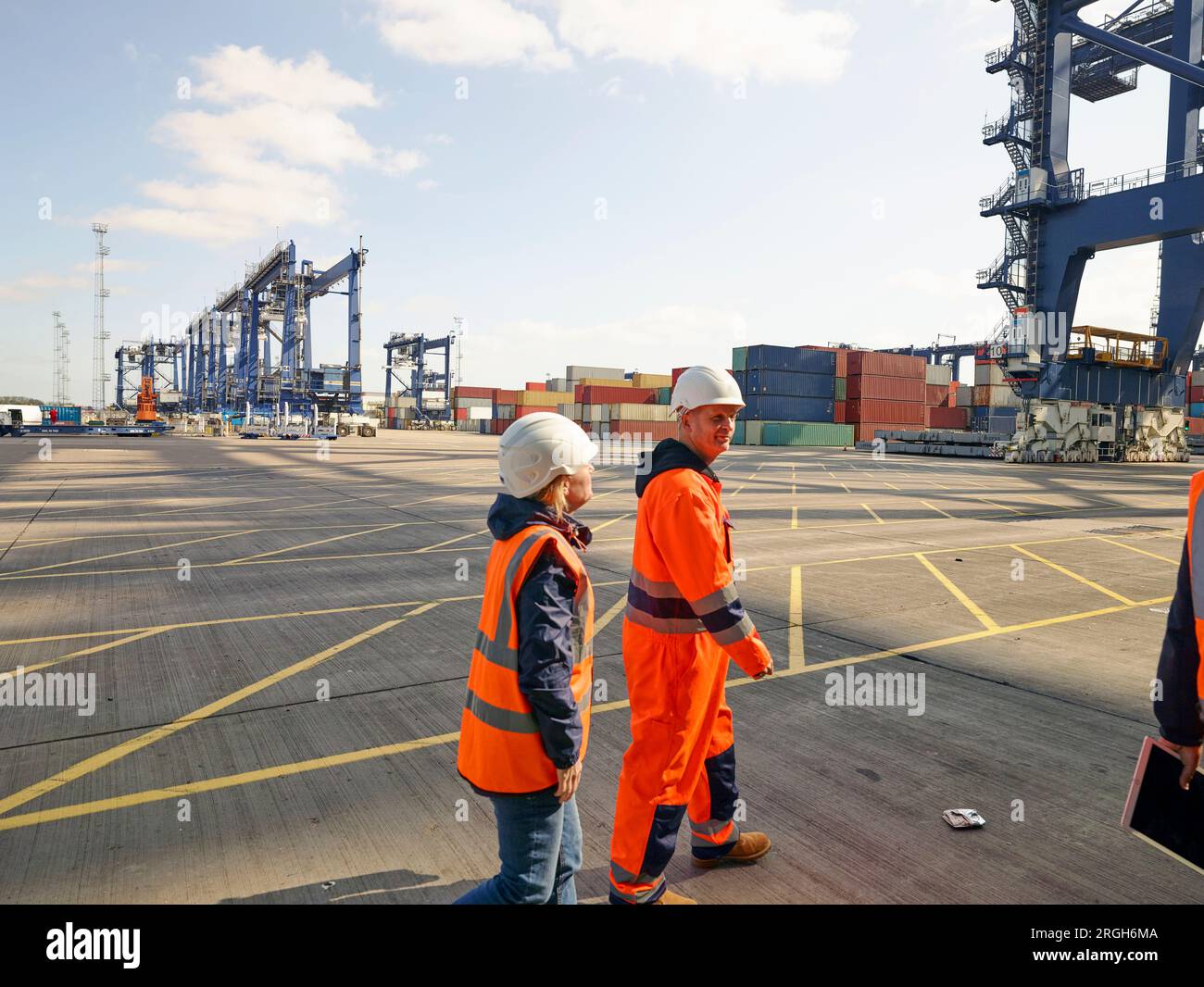 Dock workers walking at Port of Felixstowe, England Stock Photo - Alamy