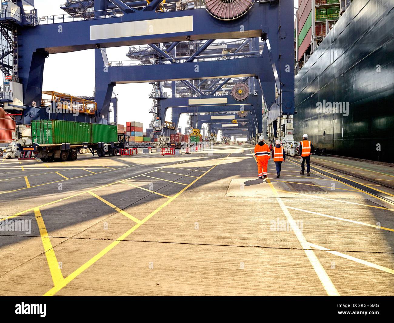 Dock workers walking at Port of Felixstowe, England Stock Photo - Alamy