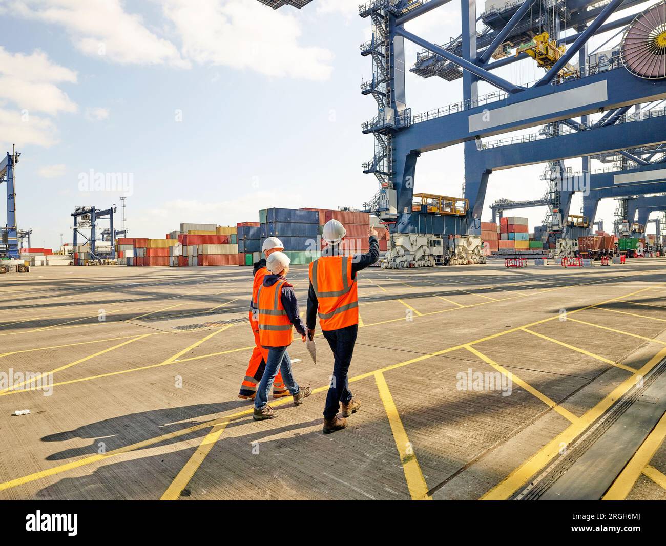 Dock workers walking at Port of Felixstowe, England Stock Photo - Alamy