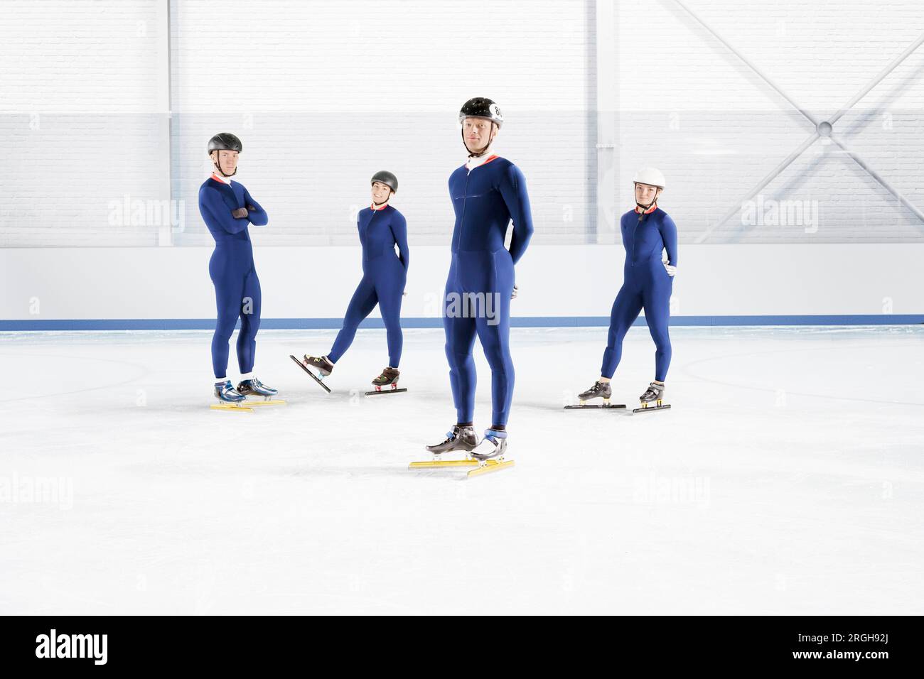 A team of speed skaters in blue uniforms at ice rink Stock Photo - Alamy
