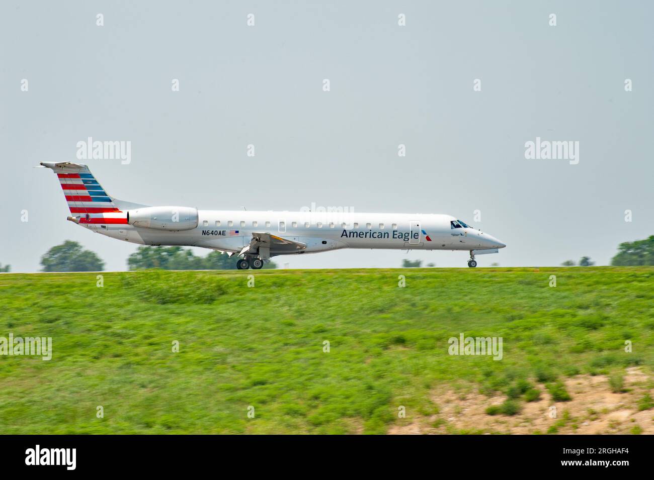 Embraer ERJ-145 jet landing at Lexington Bluegrass Airport Stock Photo ...