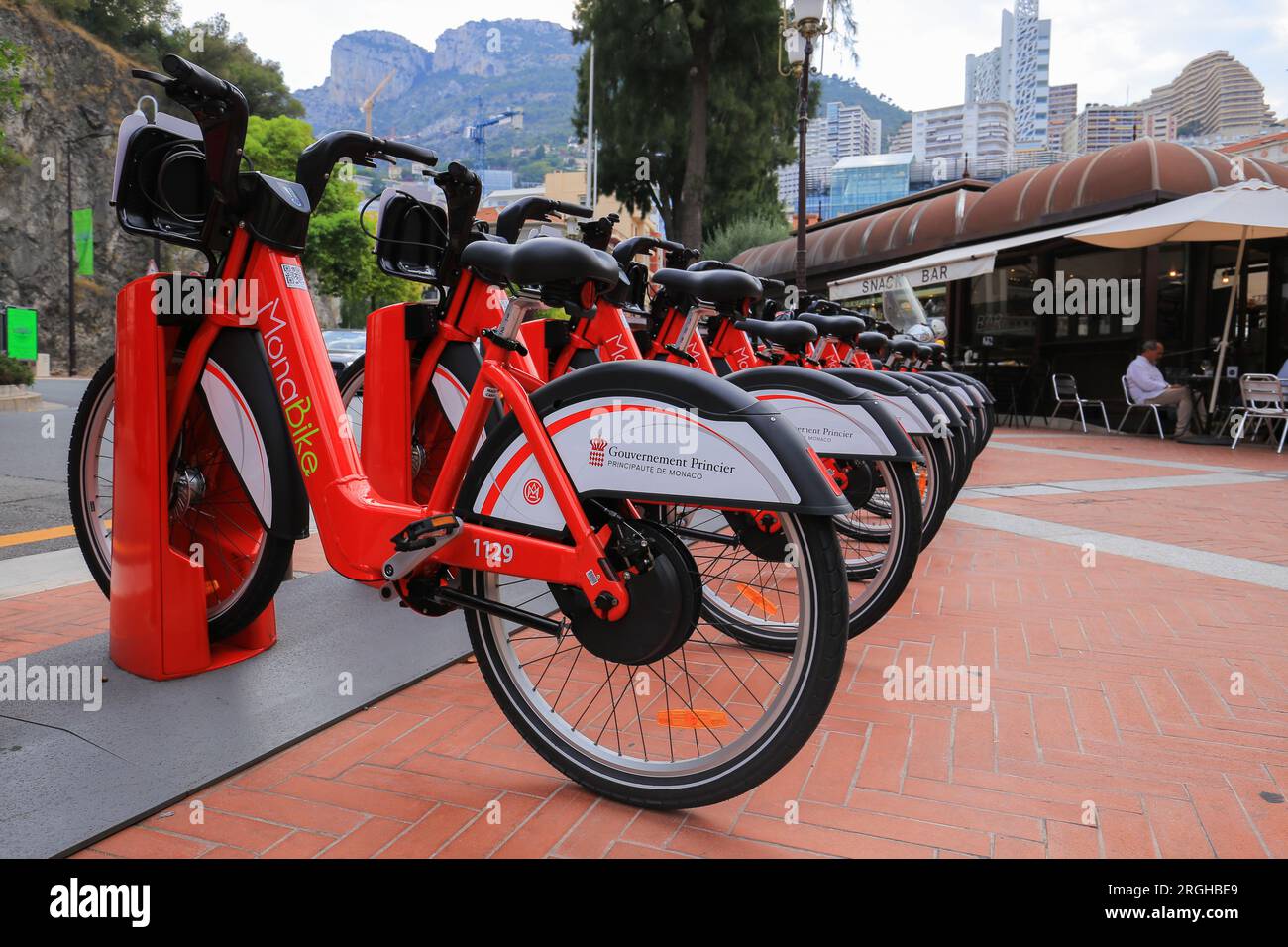 Red bicycles rental system Monabike in Monaco Stock Photo - Alamy