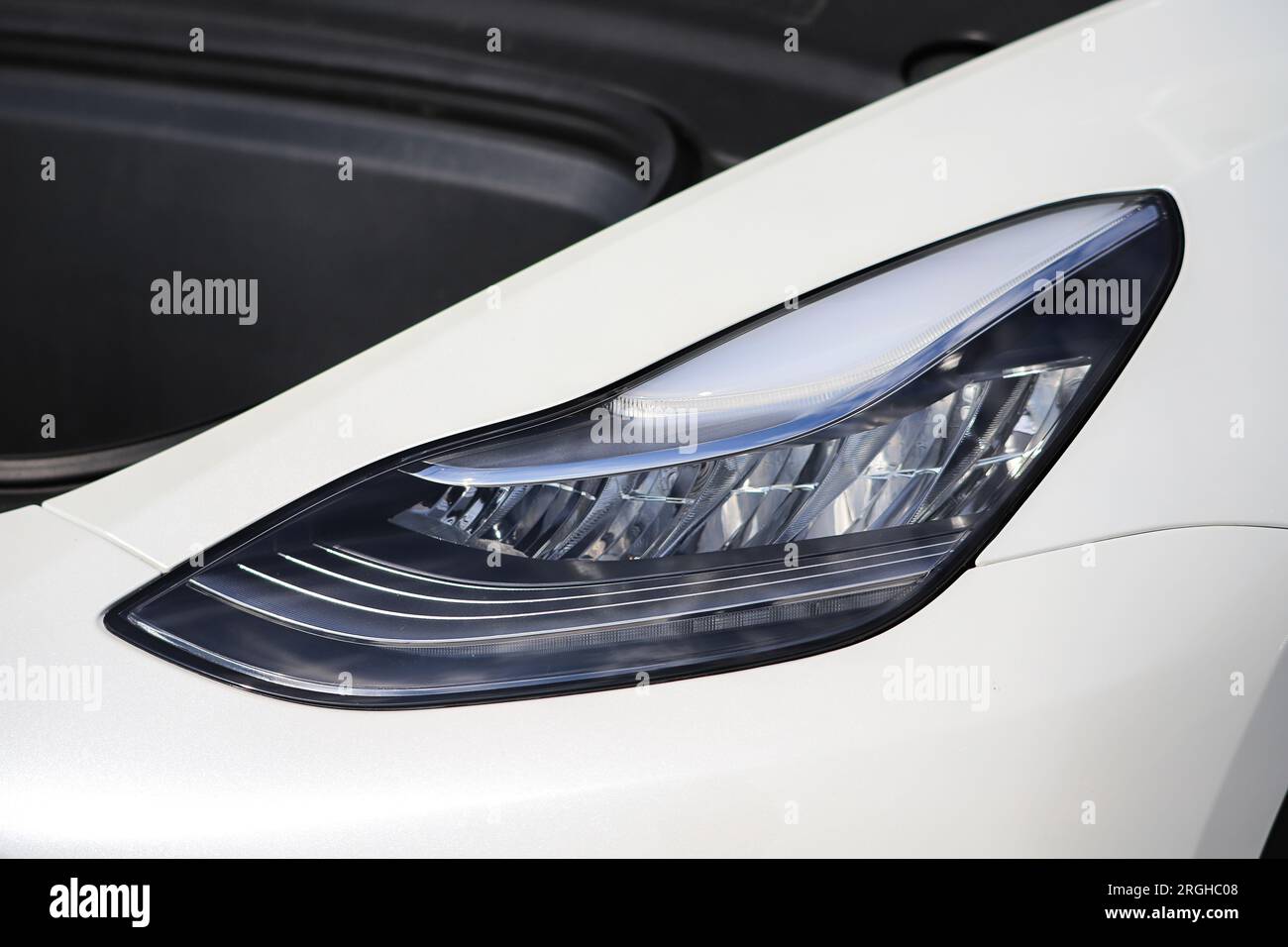 Front headlight of a white car close-up Stock Photo - Alamy