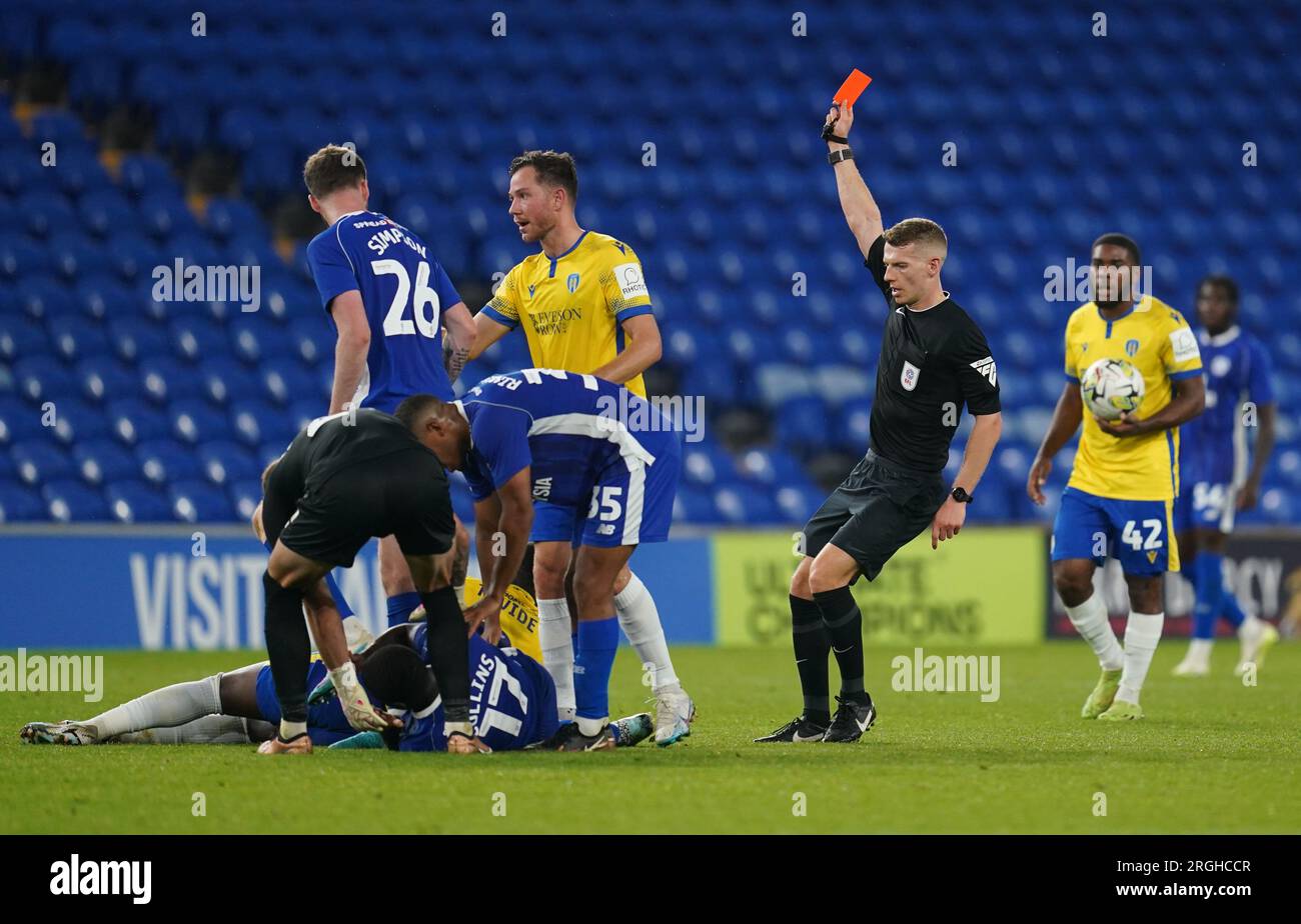 Colchester United's Samson Tovide clashes with Cardiff City's Jamilu ...