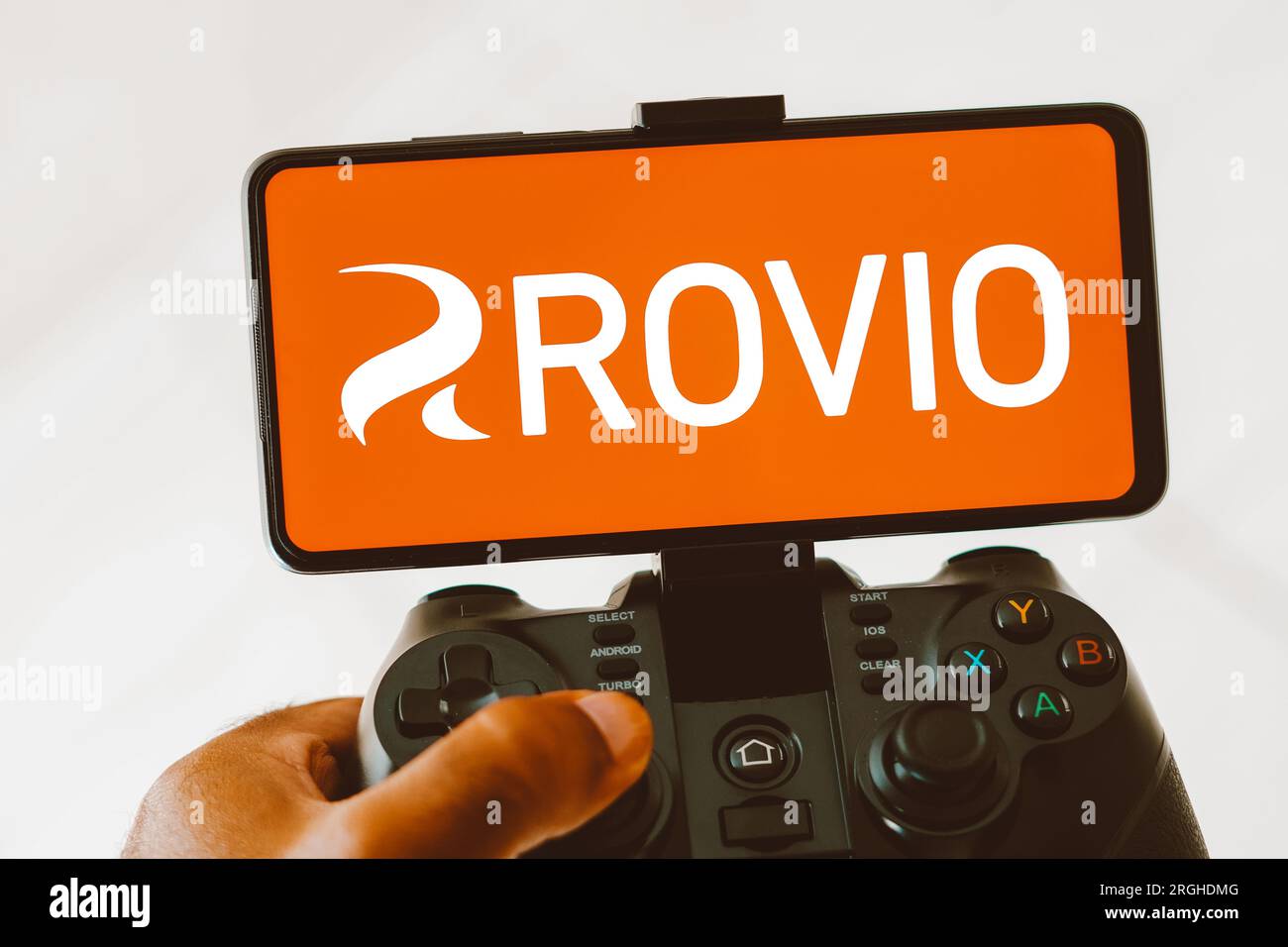 In this photo illustration, a person plays on a joystick and the Rovio ...