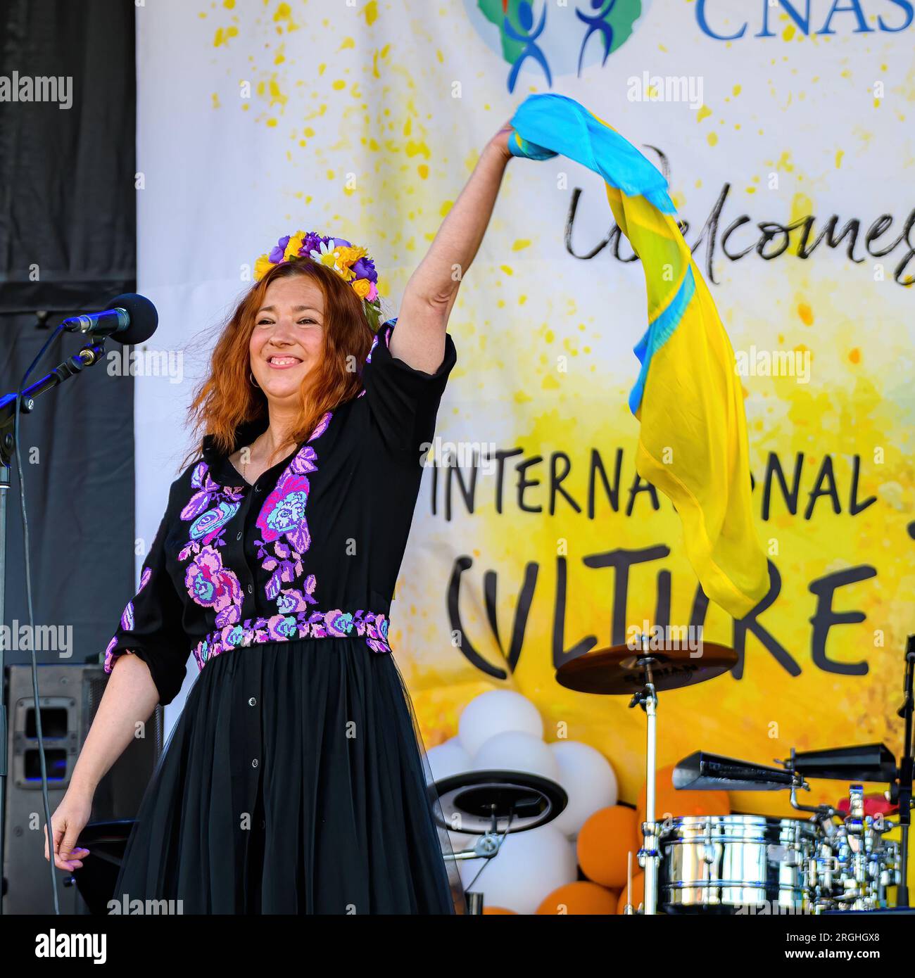 Girl singing at talent show hi-res stock photography and images - Alamy