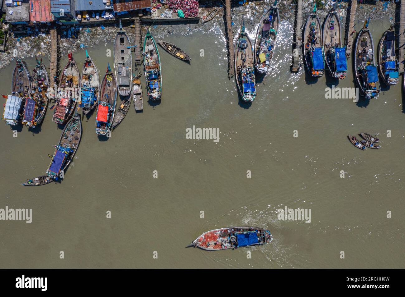 Aerial view of the Alipur fish landing station on the bank of Shibbaria ...
