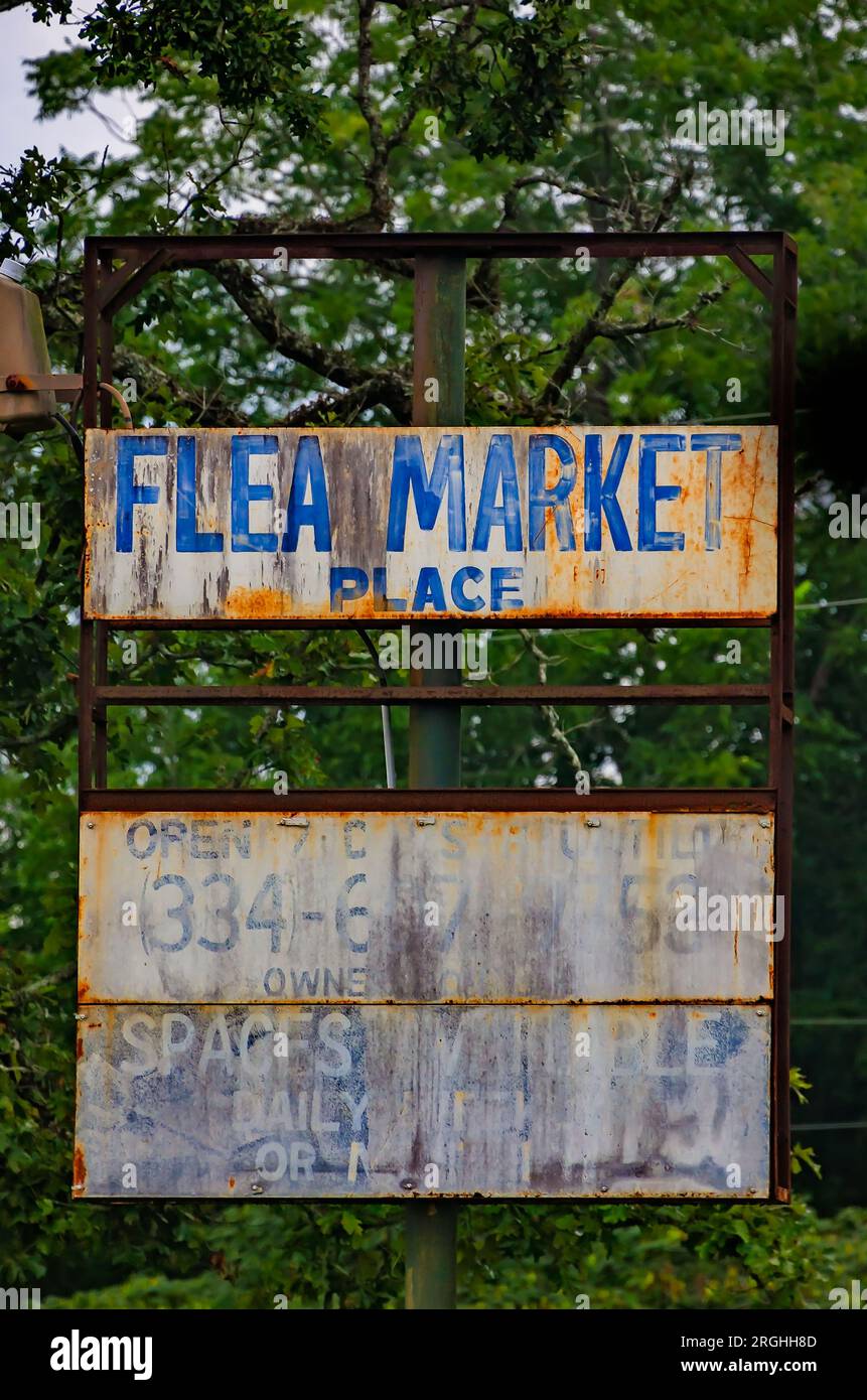 A rusted flea market sign is pictured, Aug. 8, 2023, in Mobile, Alabama ...