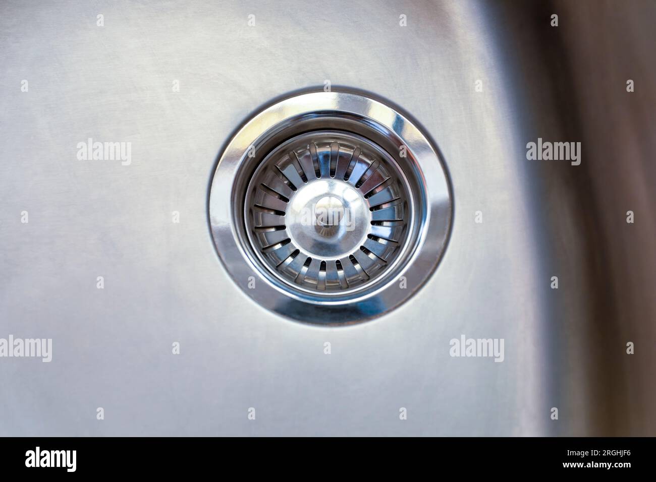 dry drain from a stainless steel kitchen basin, close up details Stock Photo - Alamy