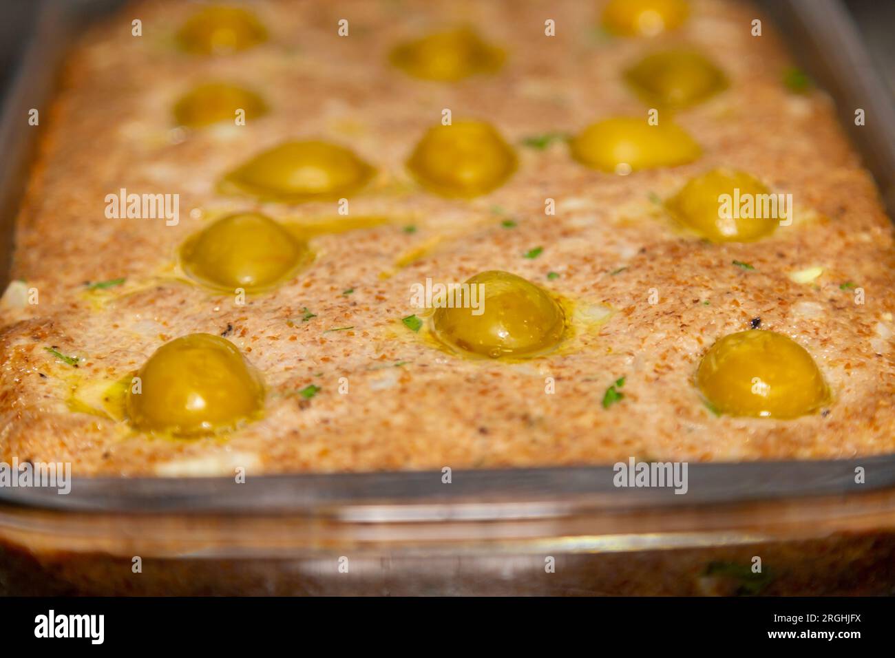 Typical kibbeh baked in the oven. Tabasco chili sauce Stock Photo - Alamy