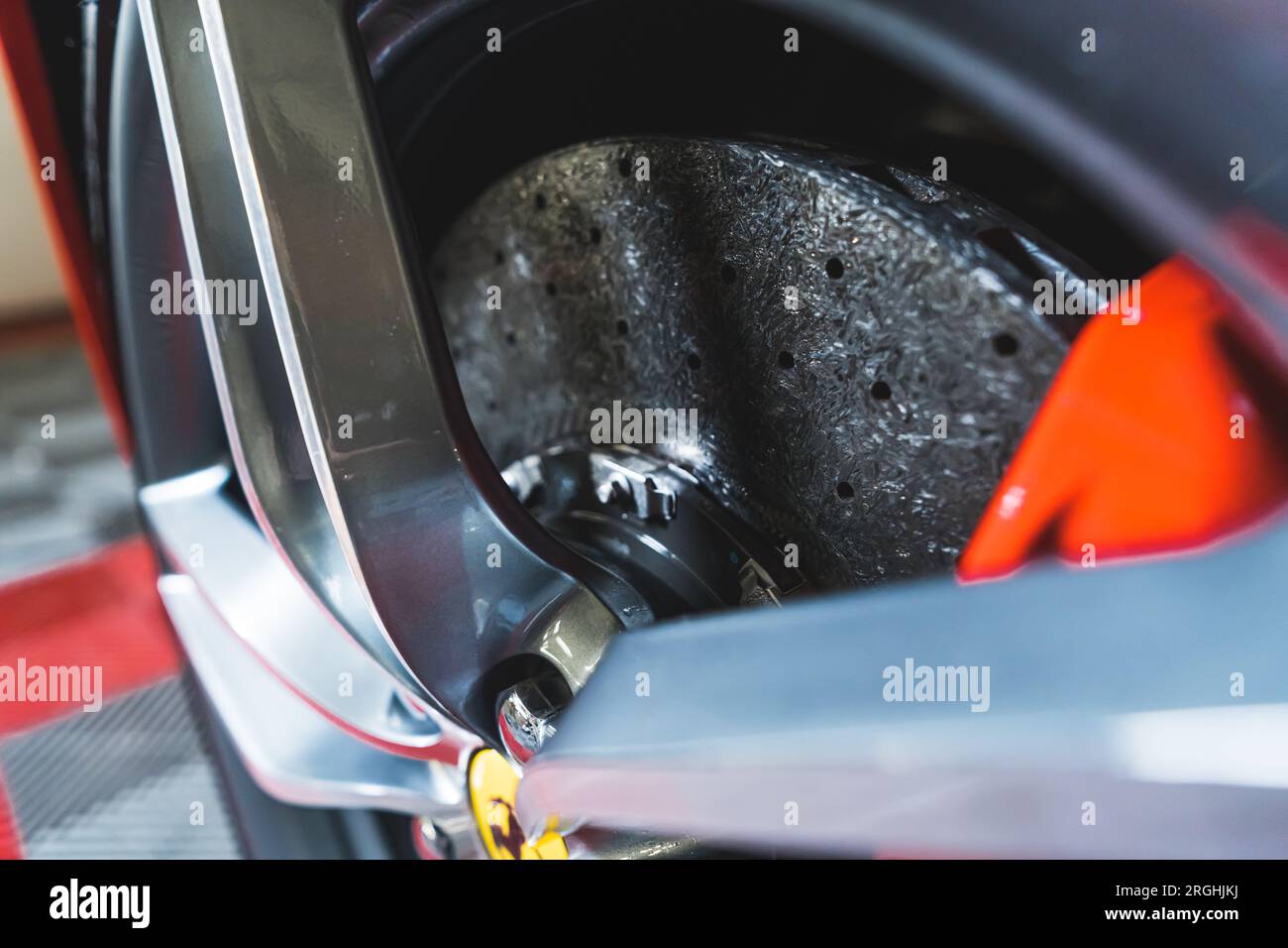 Ceramic disc brakes - Car braking system. Sport car front wheel disc ...