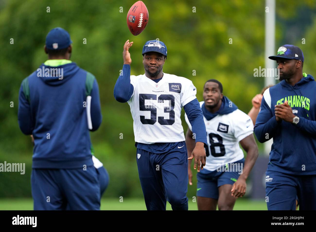 Seattle Seahawks linebacker Boye Mafe tosses the ball back during ...