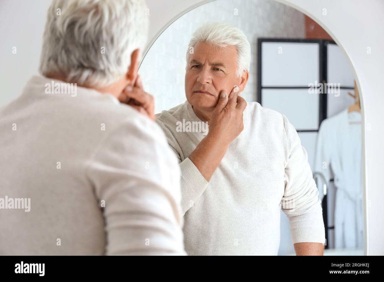 Elderly man back view mirror hi-res stock photography and images - Alamy