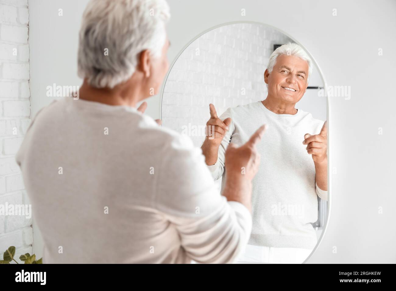 Elderly man back view mirror hi-res stock photography and images - Alamy