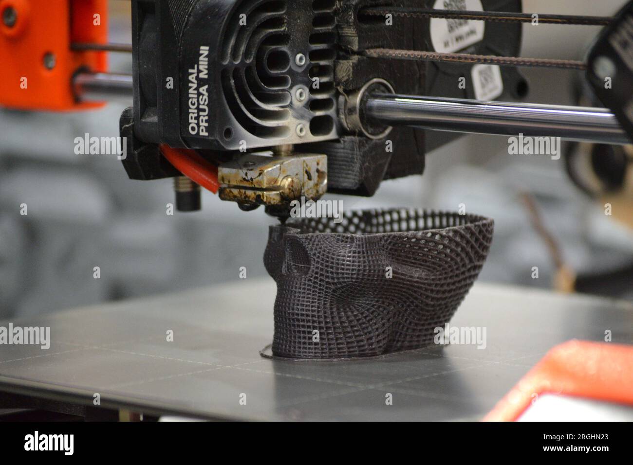 3D printer printing prototype of human skull from molten plastic ...