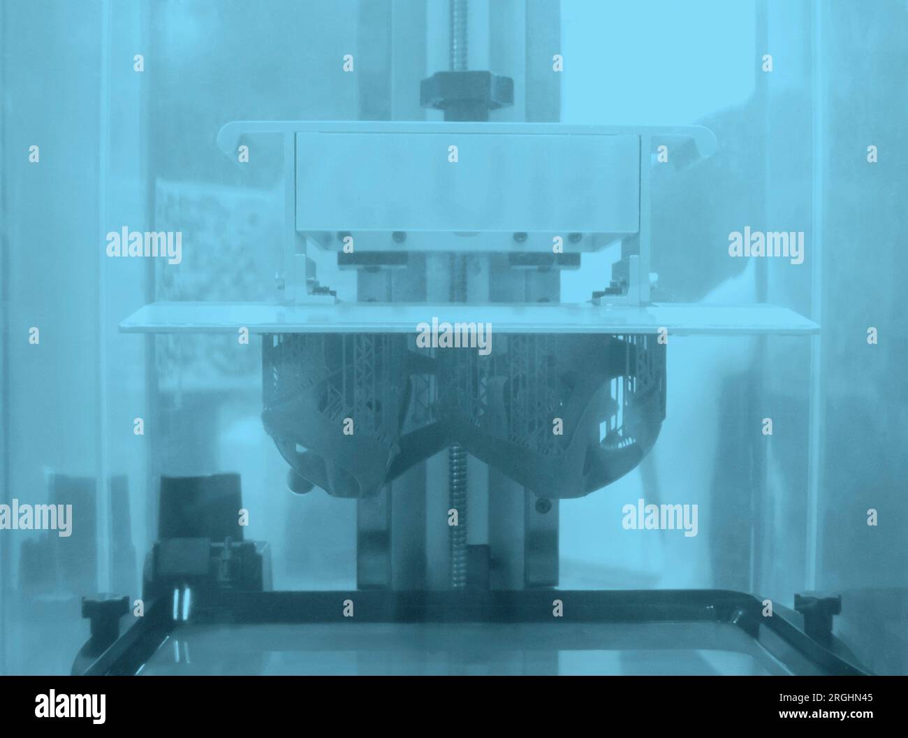 Printed models on 3D printer close-up. Objects printed on photopolymer ...