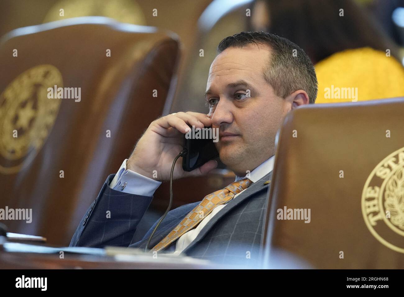 State Rep. ERNEST BAILES, (R-Shepherd) talks on his desk phone during ...
