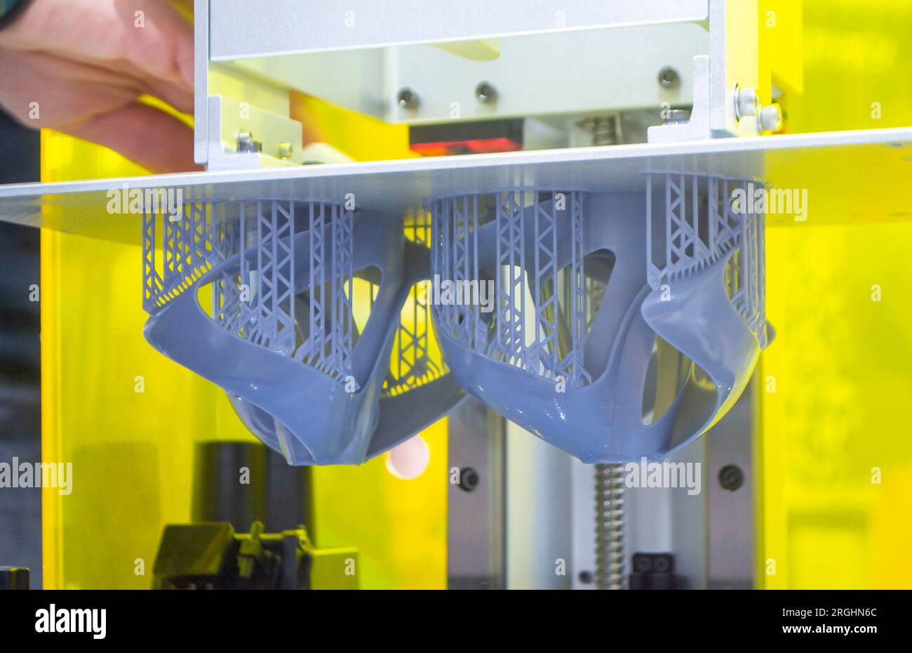 Printed models on 3D printer close-up. Objects printed on photopolymer ...