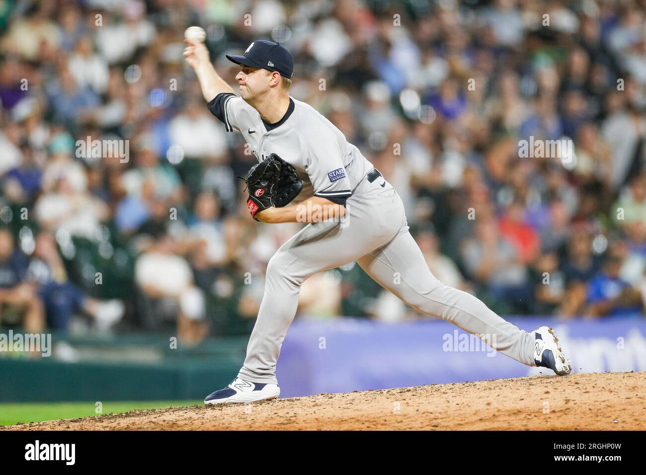 New York Yankees starting pitcher Clarke Schmidt (36) throws to the plate during a MLB regular ...