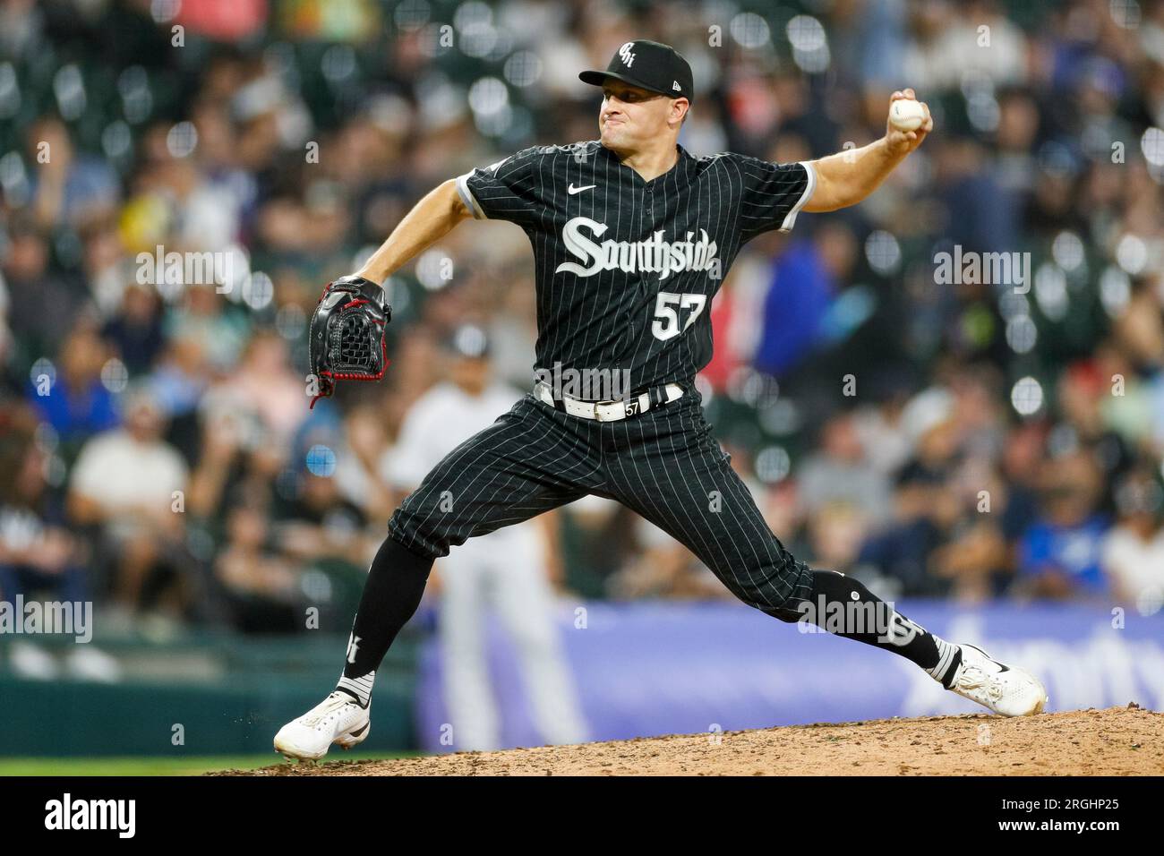 Chicago White Sox relief pitcher Tanner Banks (57) throws to the plate ...