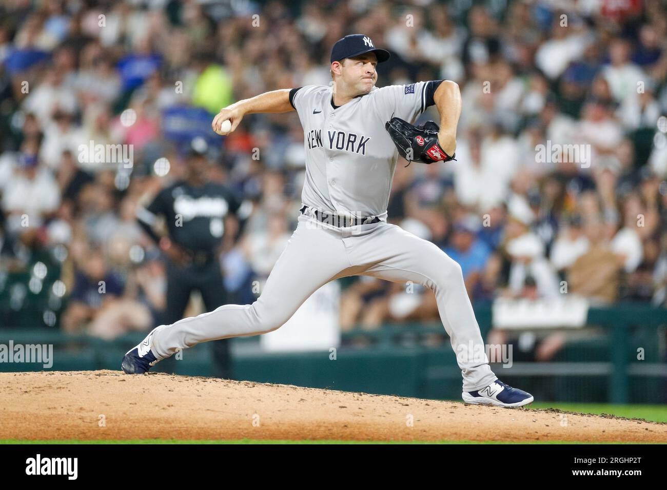 New York Yankees starting pitcher Clarke Schmidt (36) throws to the plate during a MLB regular ...
