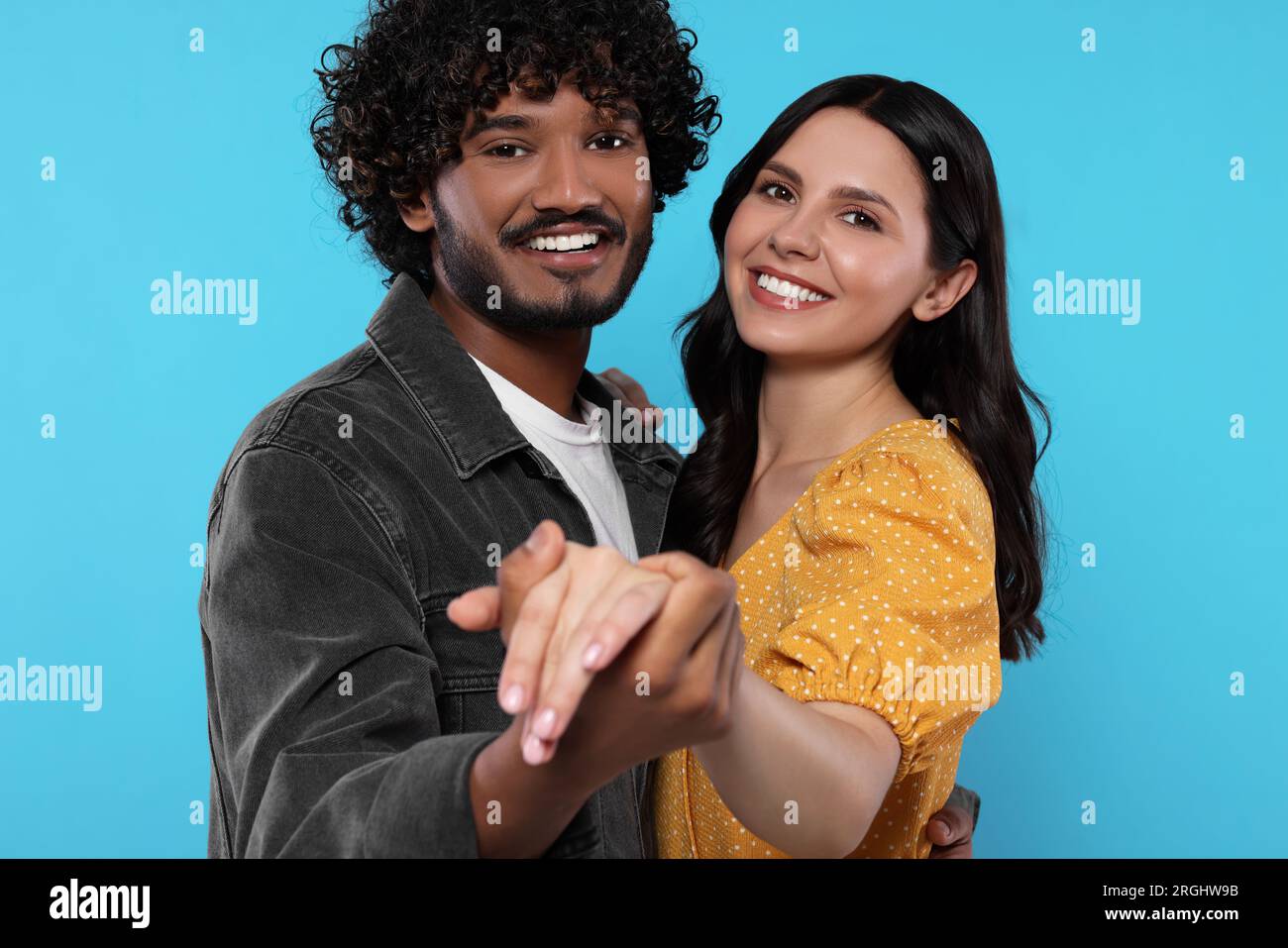 Portrait happy biracial woman dancing hi-res stock photography and ...