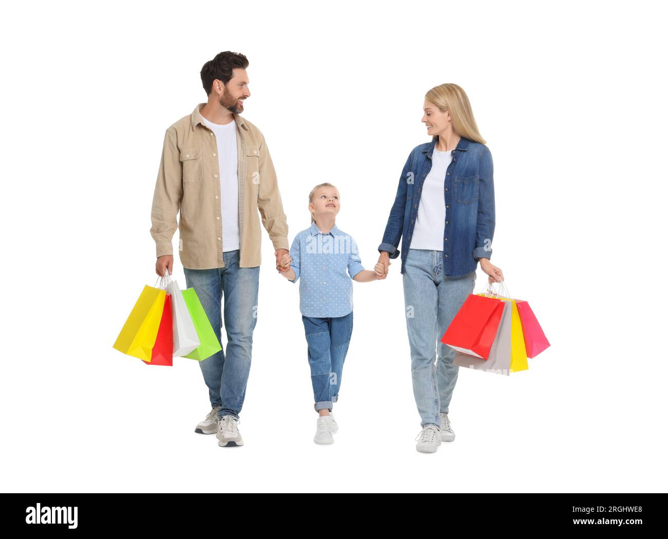 Family shopping. Happy parents and daughter with many colorful bags on ...