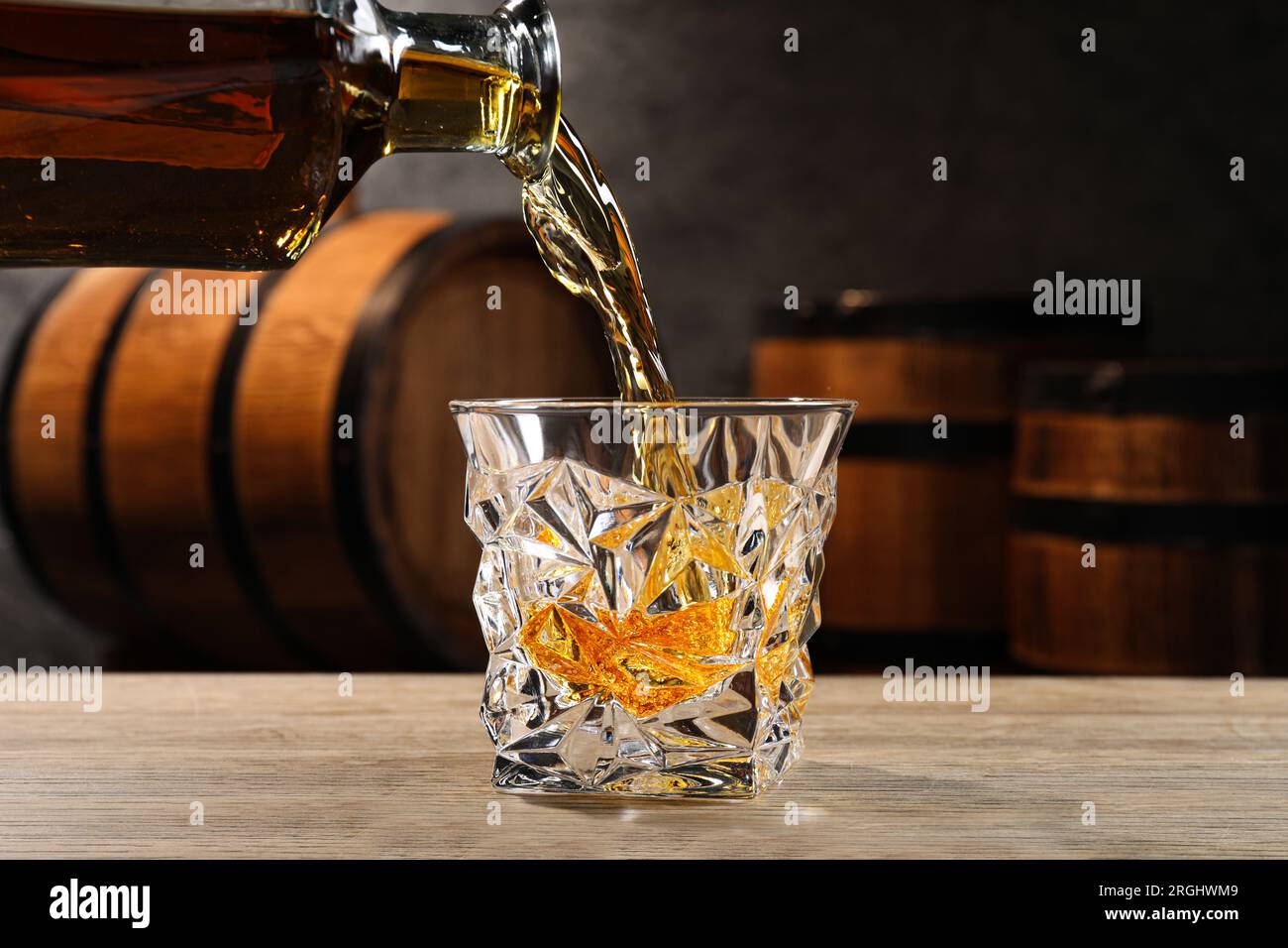 Pouring brandy from bottle hi-res stock photography and images - Alamy