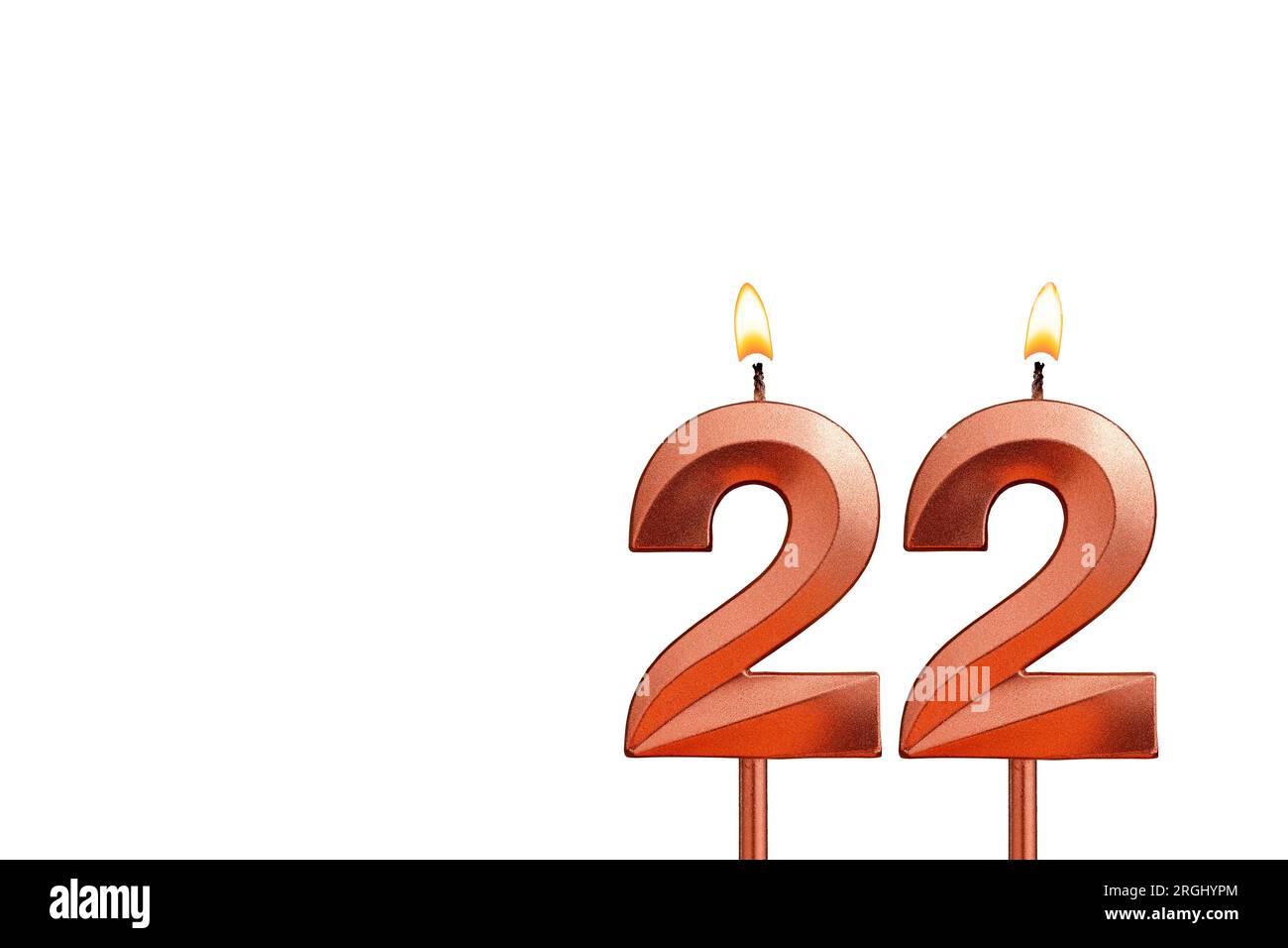 Burning candle number 22 for birthday on white background Stock Photo ...